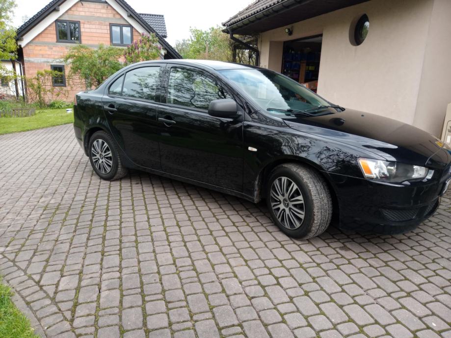 Mitsubishi Lancer 1,8, 2011 god.