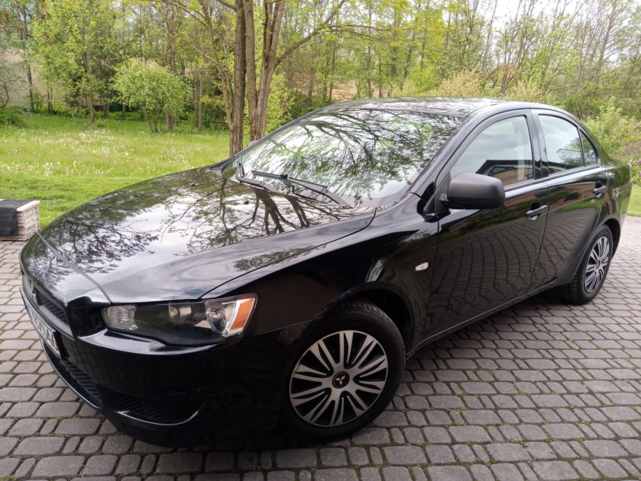 Mitsubishi Lancer 1,8, 2011 god.