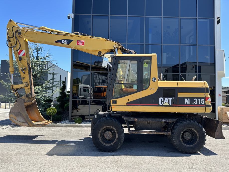 CAT M 315 BAGER TOCKAS 15 t