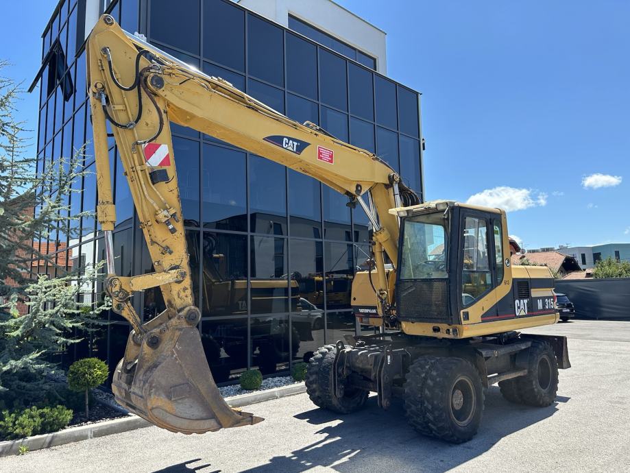 CAT M 315 BAGER TOCKAS 15 t