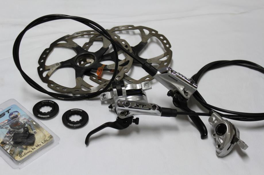 Shimano Deore XT M785 kočnice + Shimano XT RT-79 180/180 rotori