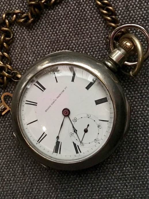 Elgin dzepni sat 1878. god sa lancem i ključem za navijanje 18 size