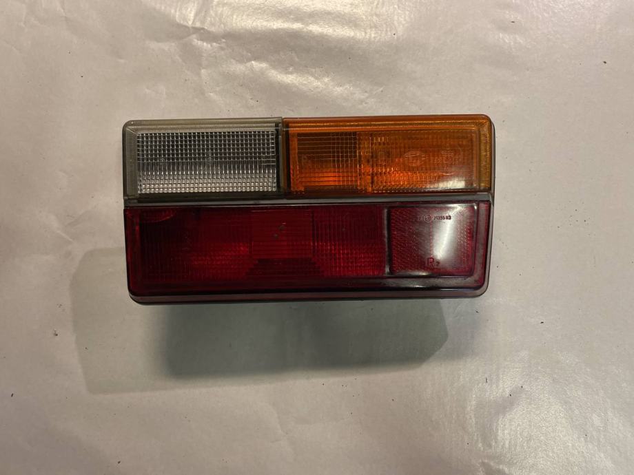 861945096 - STRAŽNJE DESNO SVJETLO DESNI FAR VOLKSWAGEN POLO 1 I HELLA