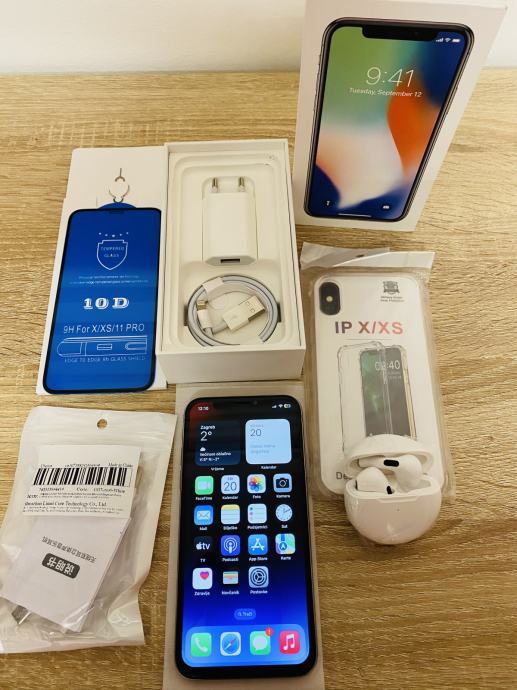 iPhone X Silver 64 GB, nova baterija i bluetooth slušalice