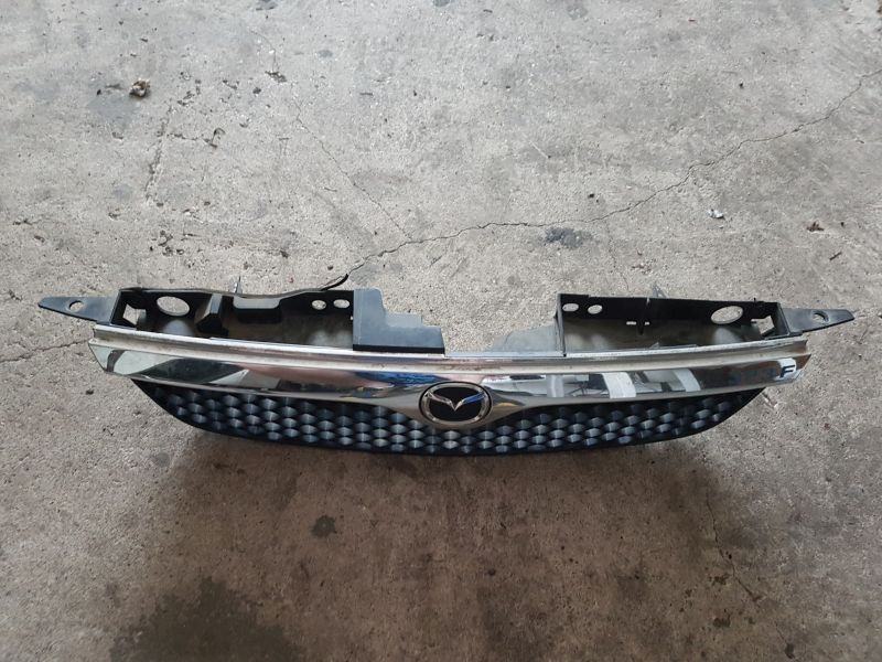 MASKA MAZDA 323F OD 98-2001.