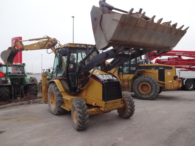 CAT 428D , 3 200 RADNIH SATI