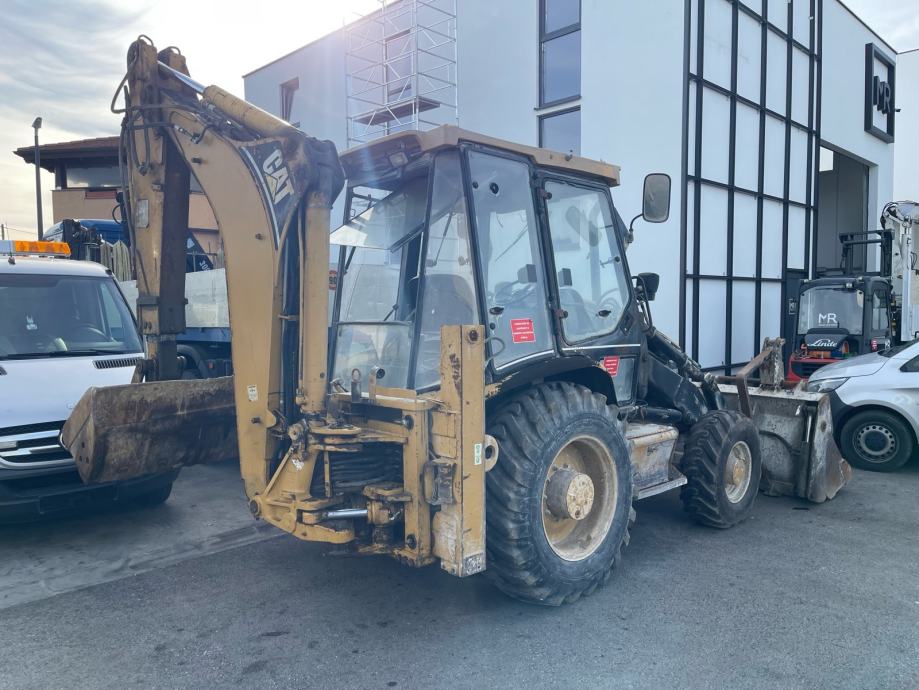 CAT 438 C Kombinirka 4x4x4
