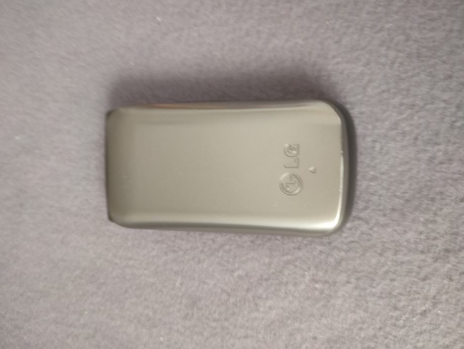 LG A250 ,091/092 mreže, sa punjačem --očuvan, baterija odlična