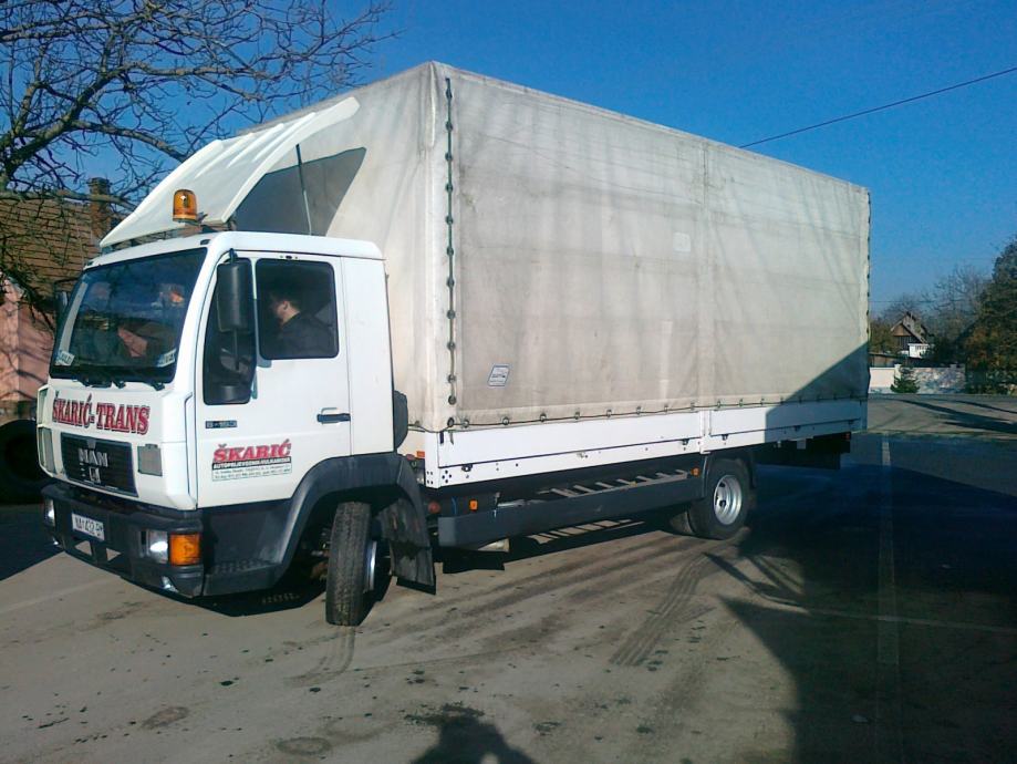 man 8-163, 2000 god.