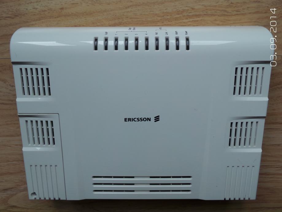 Ericsson T063G router za optiku, dolazi sa optičkim kabelom.