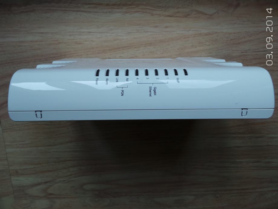 Ericsson T063G router za optiku, dolazi sa optičkim kabelom.