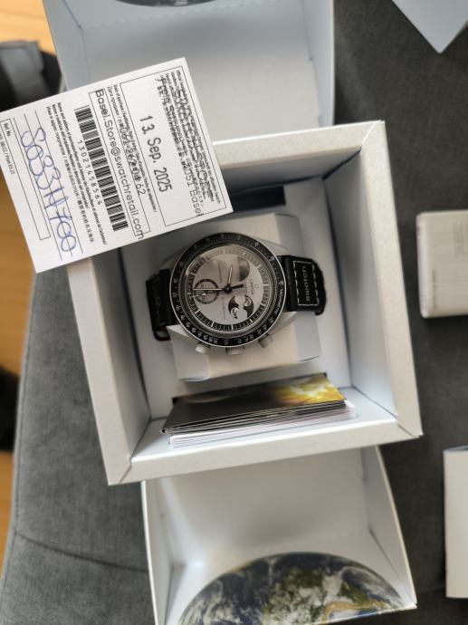 Omega swatch earthphase