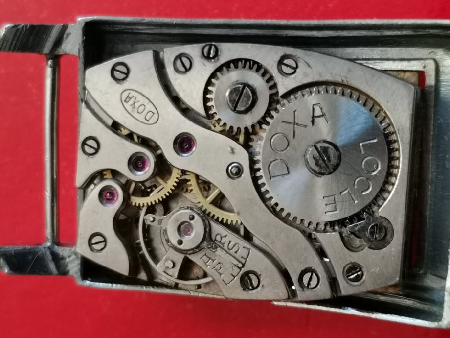 SAT DOXA LOCLE RECTANGULAR STAYBRITE-SWISS-1920. GODINA