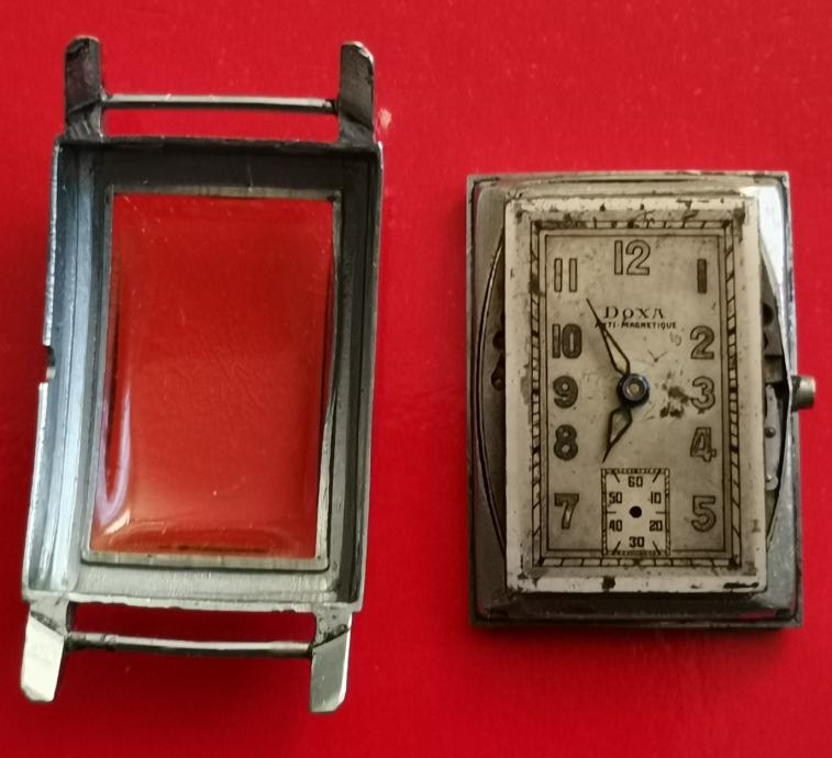 SAT DOXA LOCLE RECTANGULAR STAYBRITE-SWISS-1920. GODINA