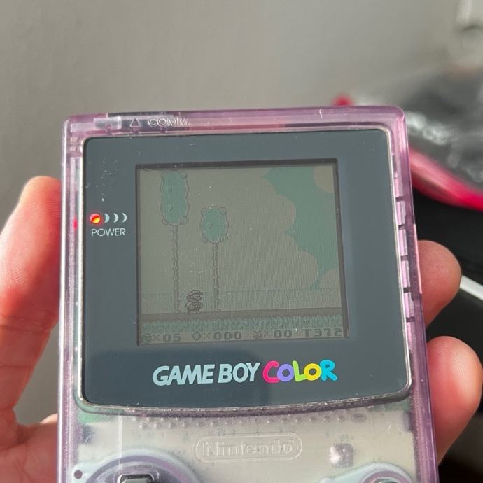 Game Boy Color (Atomic Purple) + Super Mario Land 2