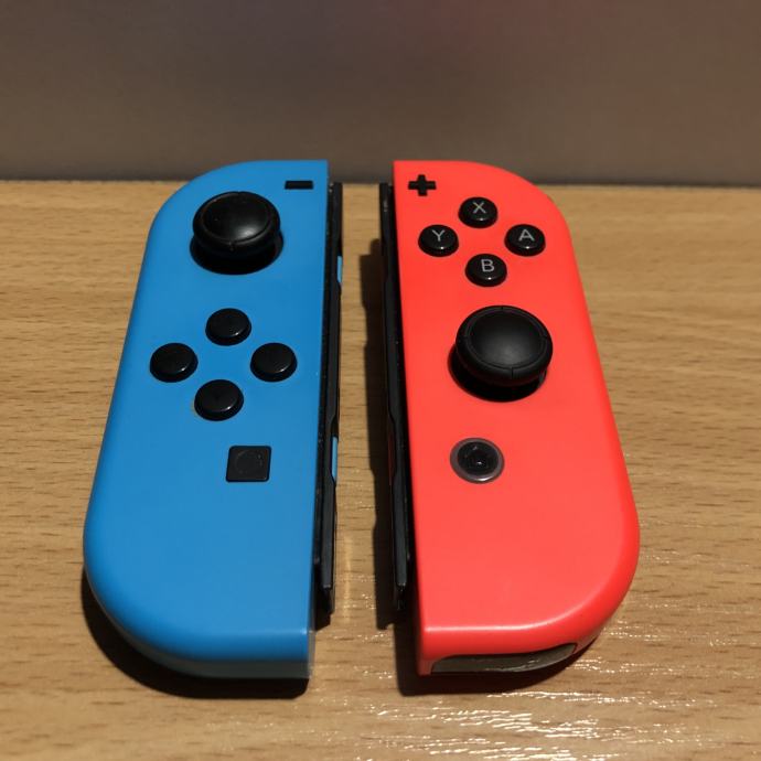 Nintendo Joy-Con set (neon red/blue) s neispravnim stikovima