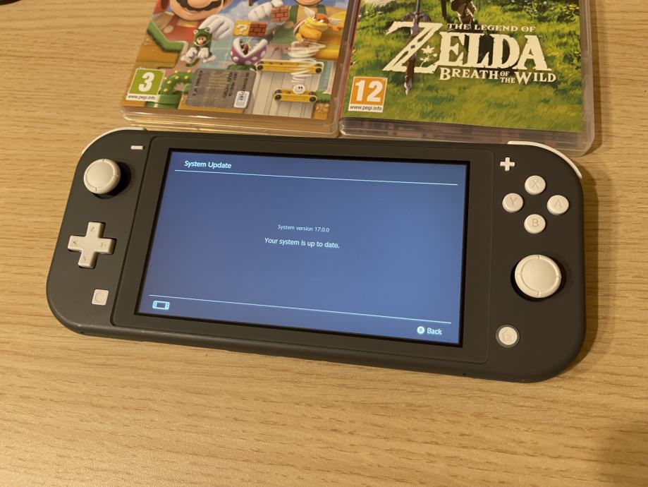 Nintendo Switch Lite + 2 Igre
