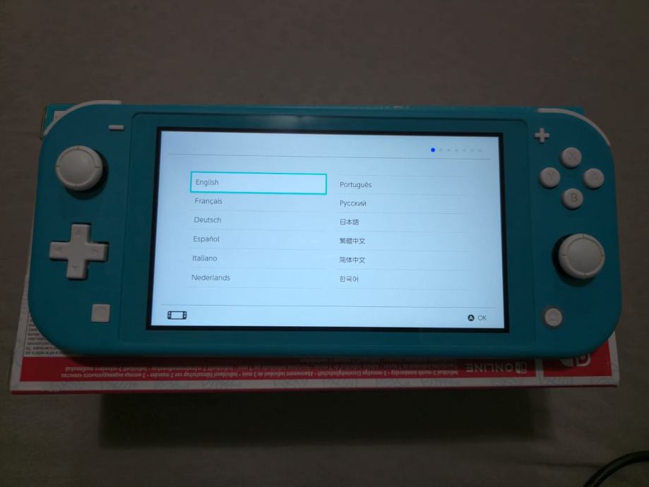 Nintendo Switch Lite + 5 igra