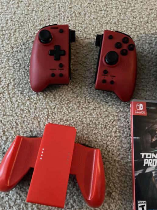 Nintendo Switch OLED 256GB + 10 igara