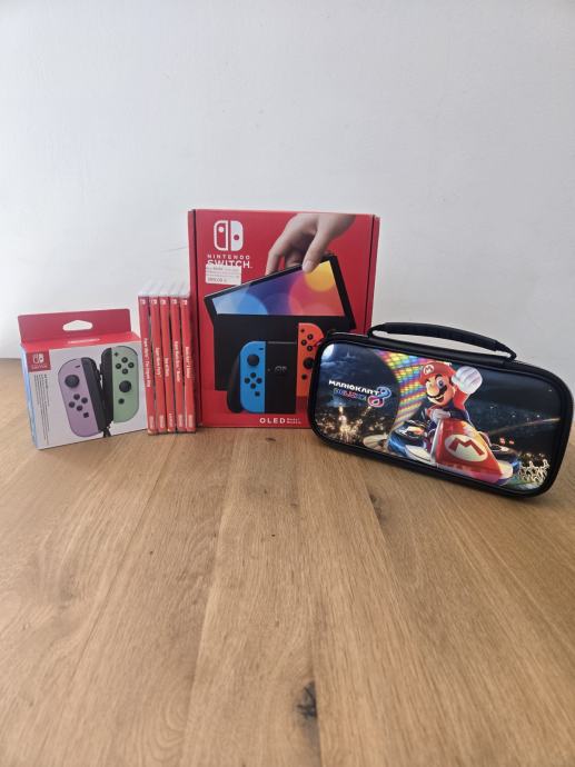 Nintendo Switch OLED + Igrice