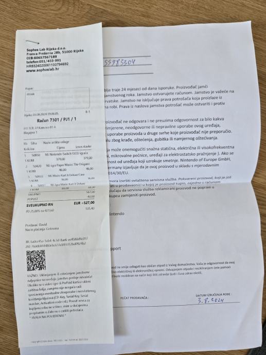 Nintendo Switch OLED + Igrice