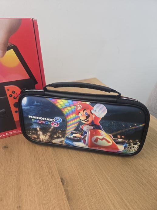 Nintendo Switch OLED + Igrice