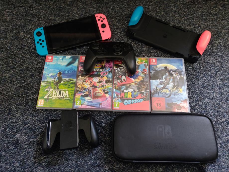 Nintendo Switch + Pro Controller + 4 Igre + Account + Dodatna oprema
