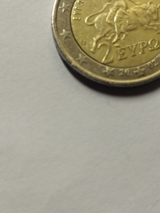 Grcka Kovanica.2.€..God 2002. S.)Zvijezde do Ruba prstena.2€ Presecen