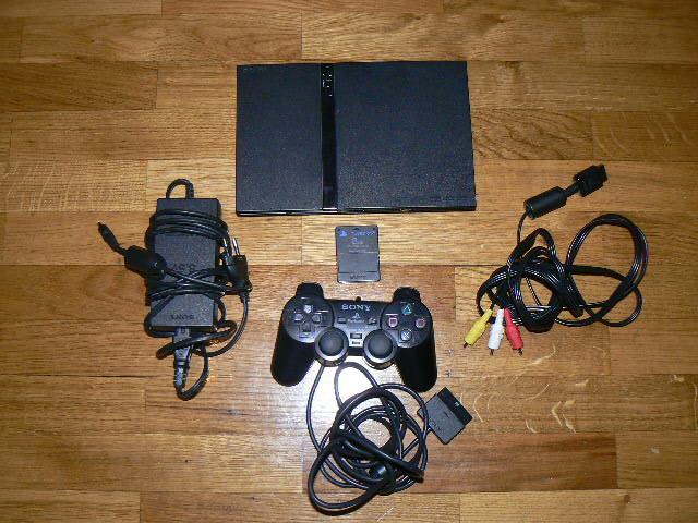 PRODAJEM PLAY STATION 2, 17 ORIGINAL IGRICA I SMARTBOX VOLAN