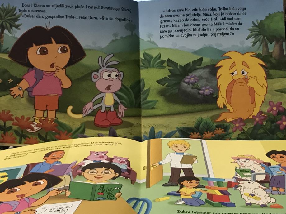 Dora Istražuje - 2x knjige: lijepo ponašanje + posjet zubaru | očuvano