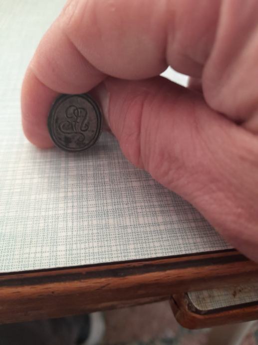 stari srebreni pečat u obliku ribe