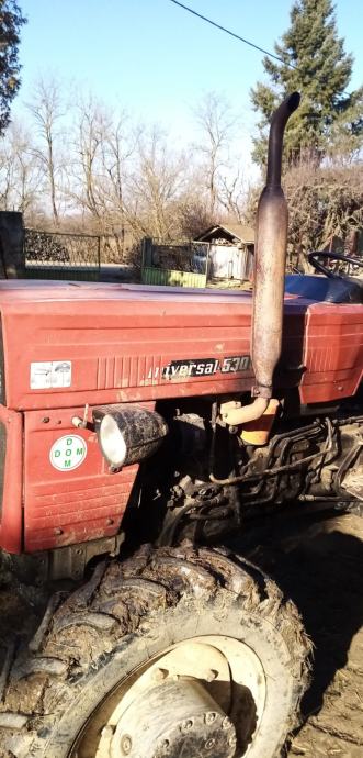 Universal 530 DTC Samoutovarna prikolica i Ruljača za kukuruz