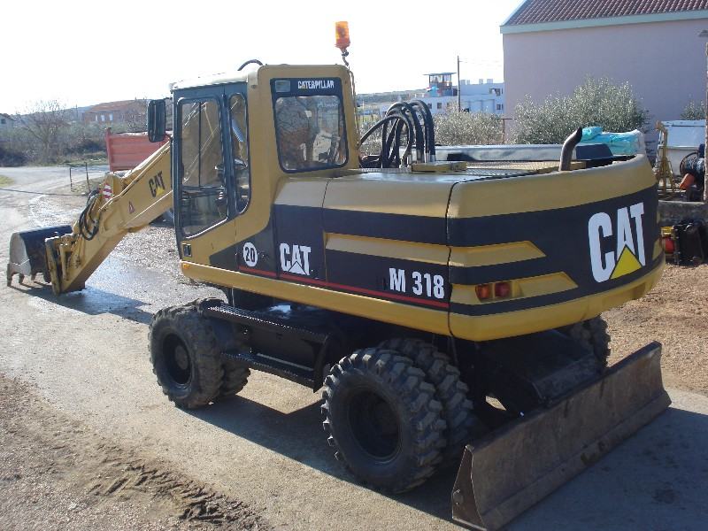 CATERPILLAR M 318 Cijena Po Dogovoru!!!!