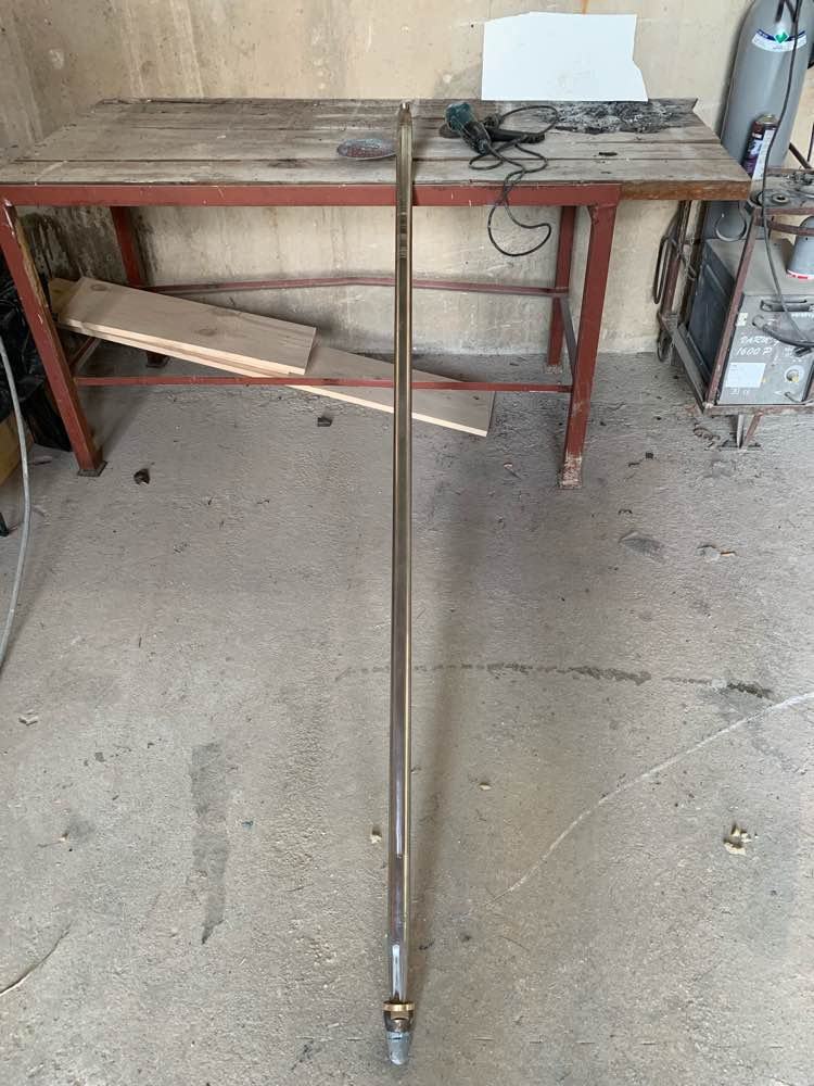 Osovina fi 40 komplet sa maticom i prirubnicom