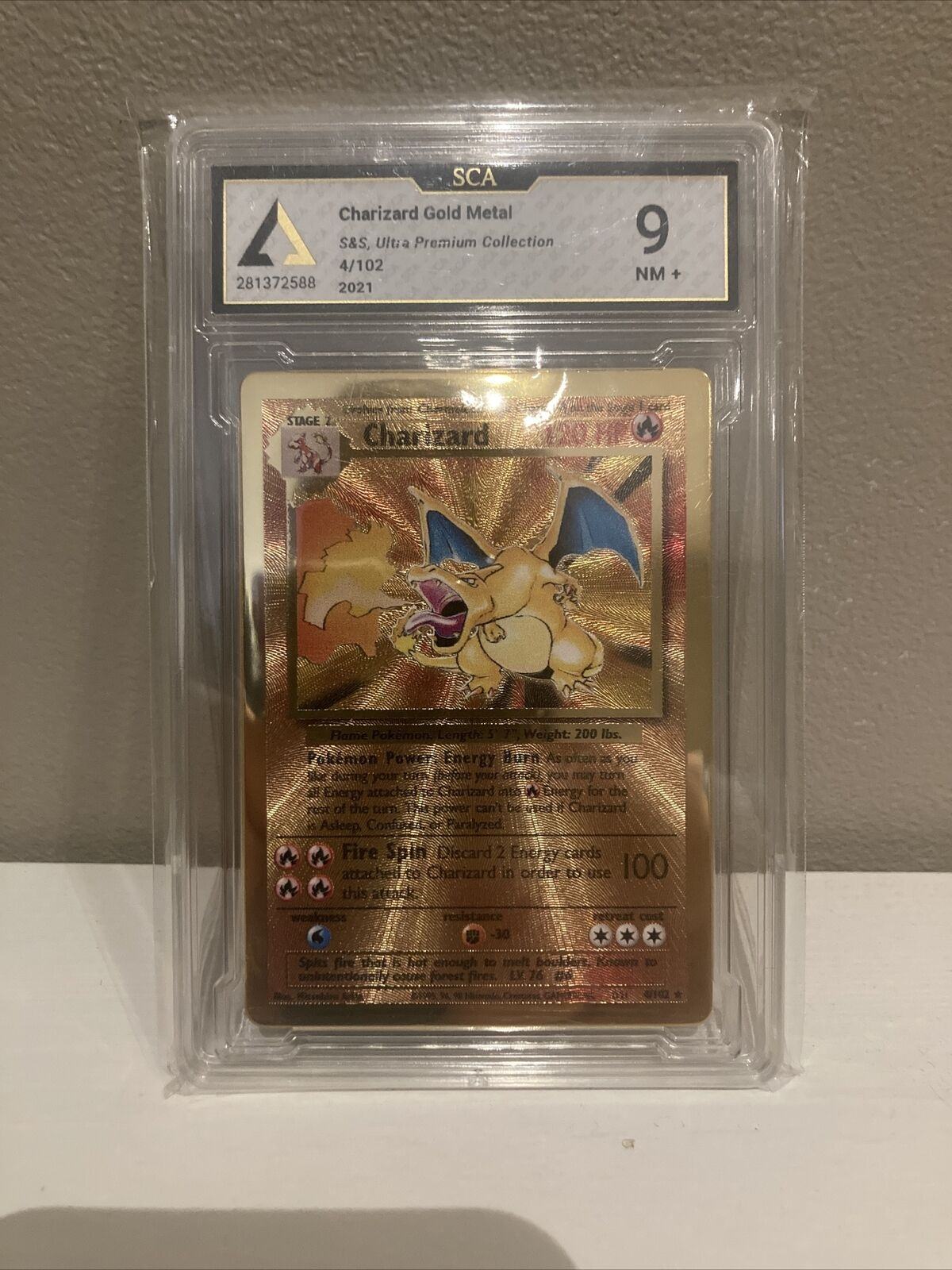 Charizard Gold Metal - Graded SCA 9 NM+ 4/102 - Pokemon