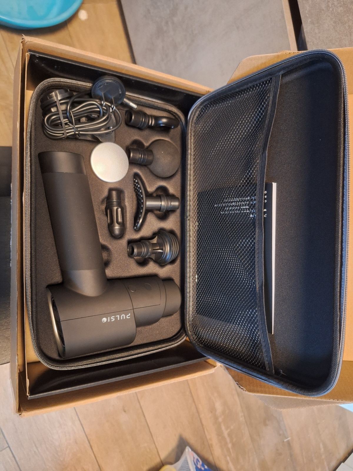 Pulsio elite masazni pistolj + torba, punjač, nastavci