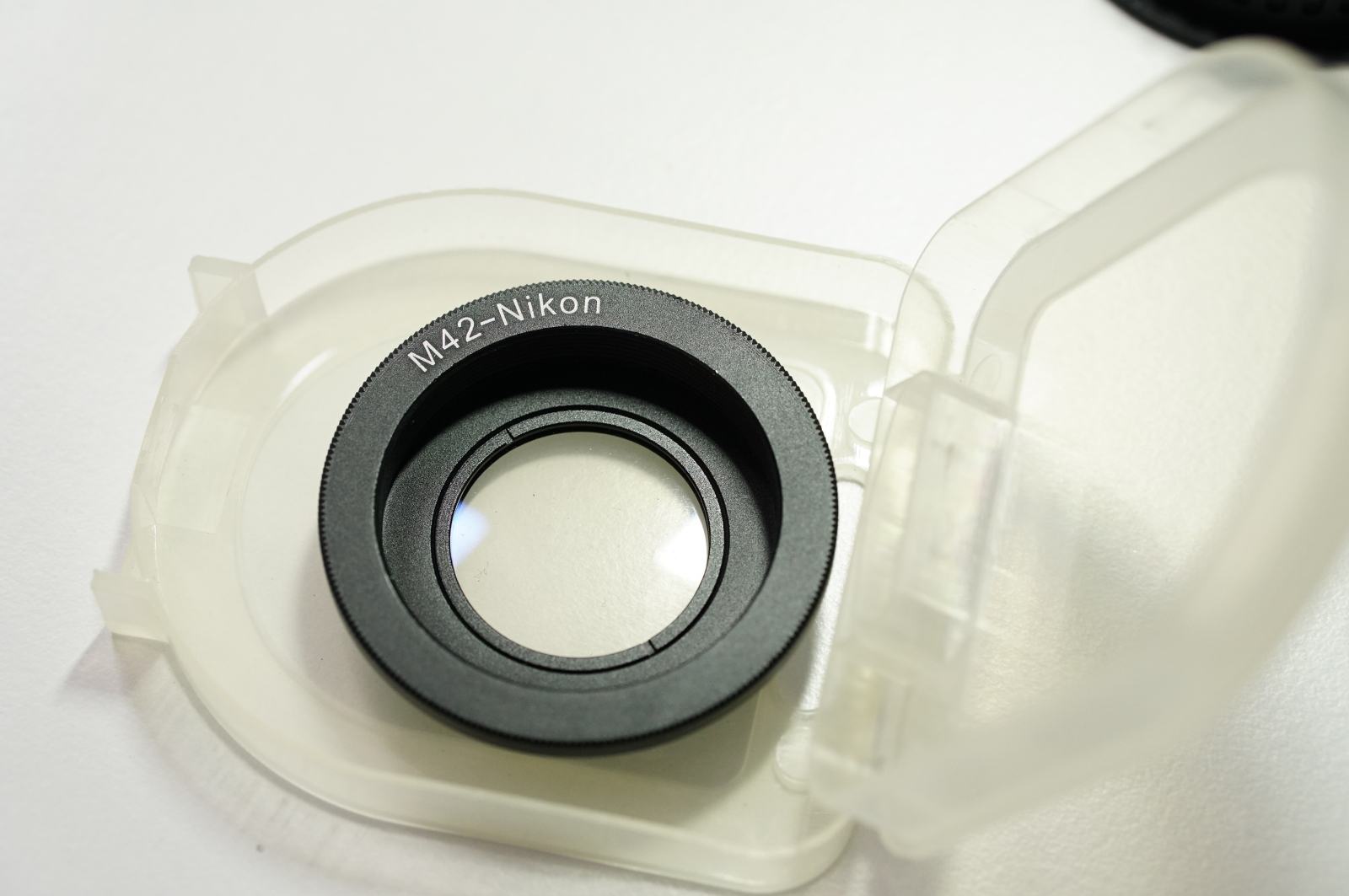 Nikon na M42 adapter s lećom za infinity focus