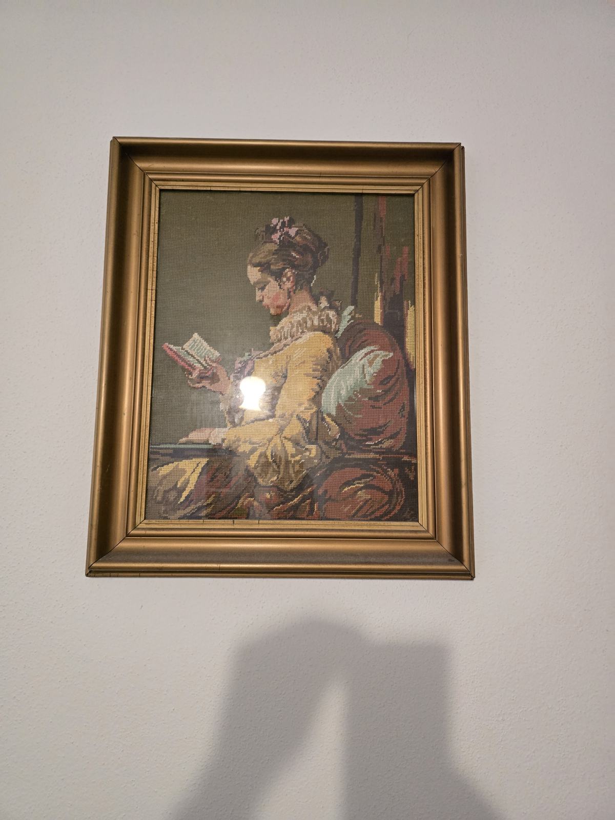 Goblen slika uokvirena.