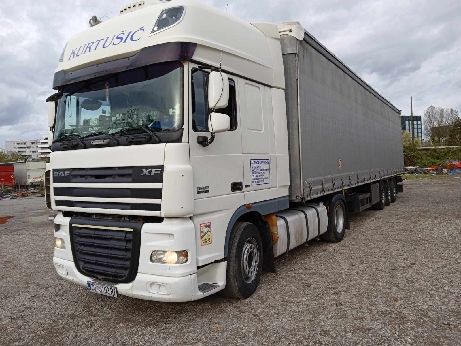 Kamion Daf xf 105 460 eev i Poluprikolica SCHMITZ CARGOBULL, 2010 god.