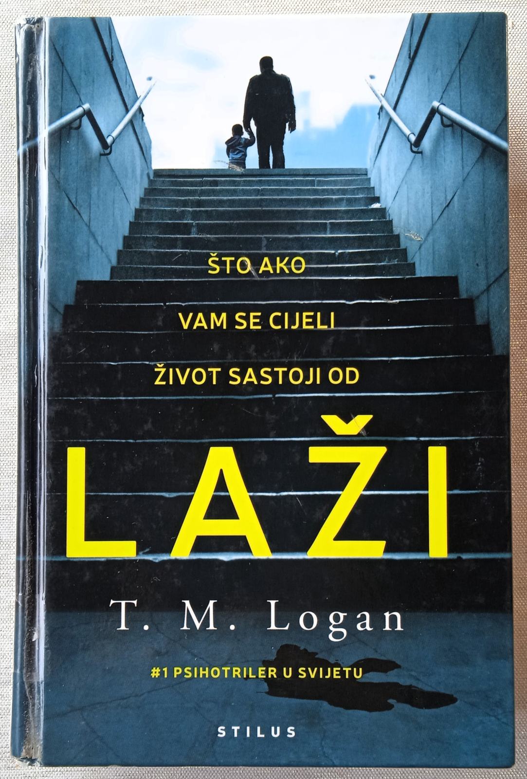 LAŽI T. M. Logan