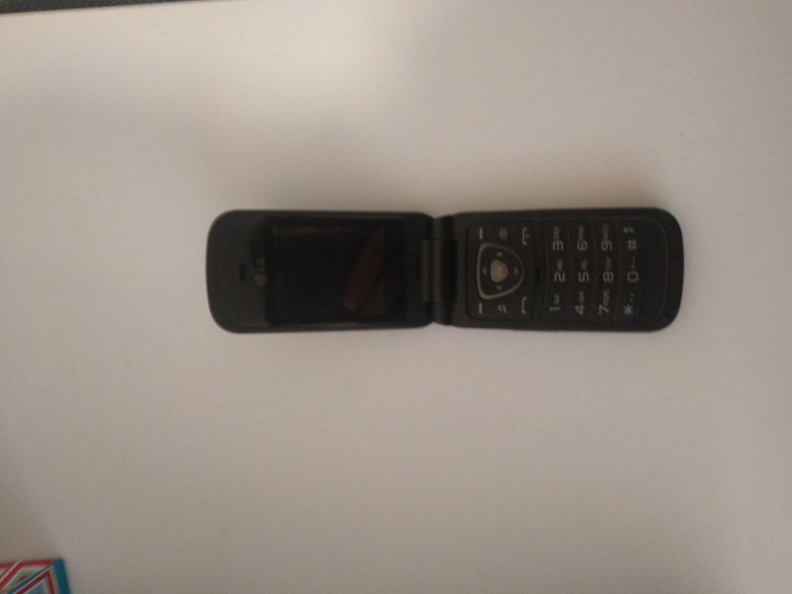 LG A250,095(Telemach) mreža,sa punjačem--preklopni