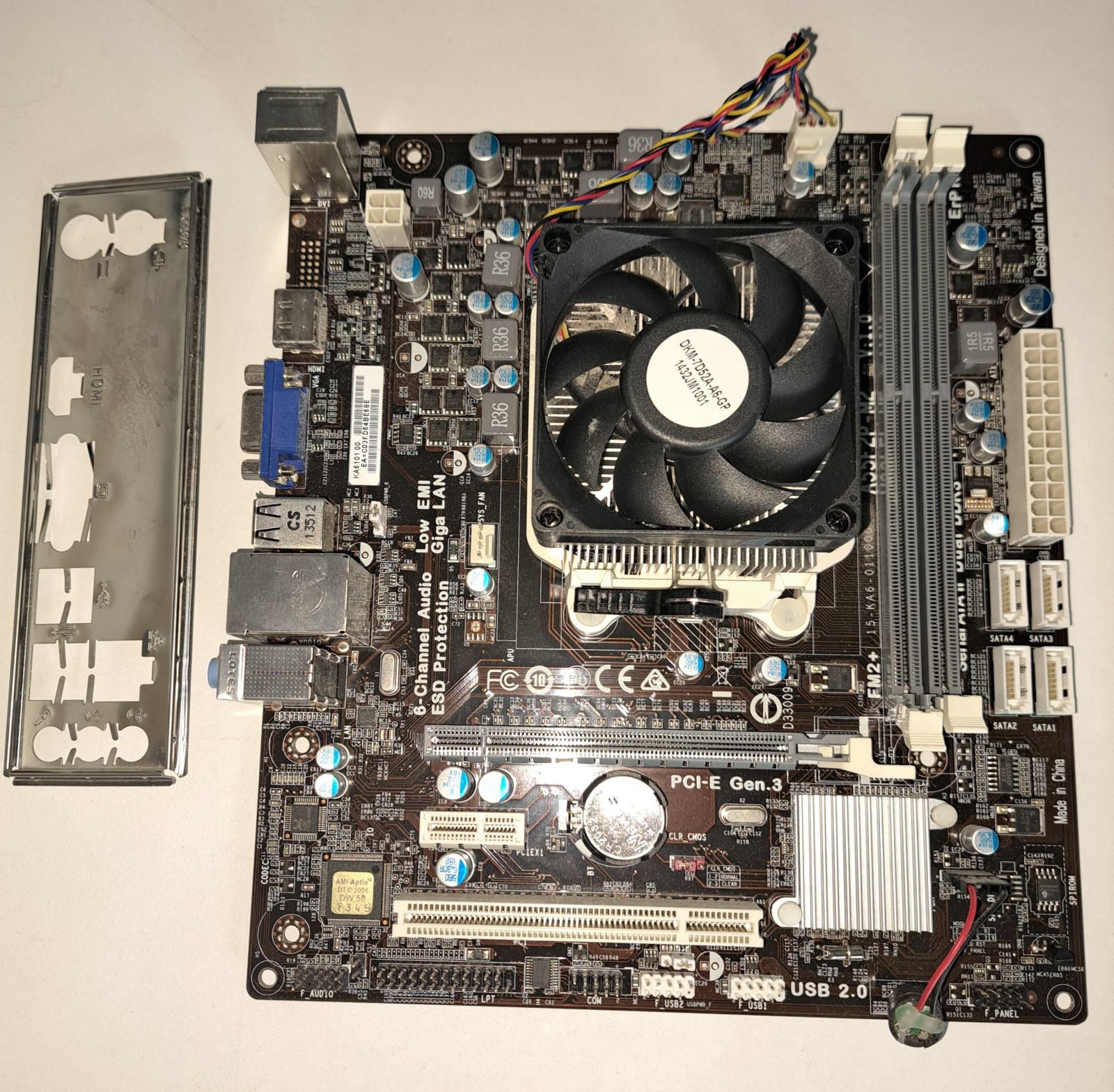 ECS A55F2P-M2 + CPU + hladnjak + stražnji limić