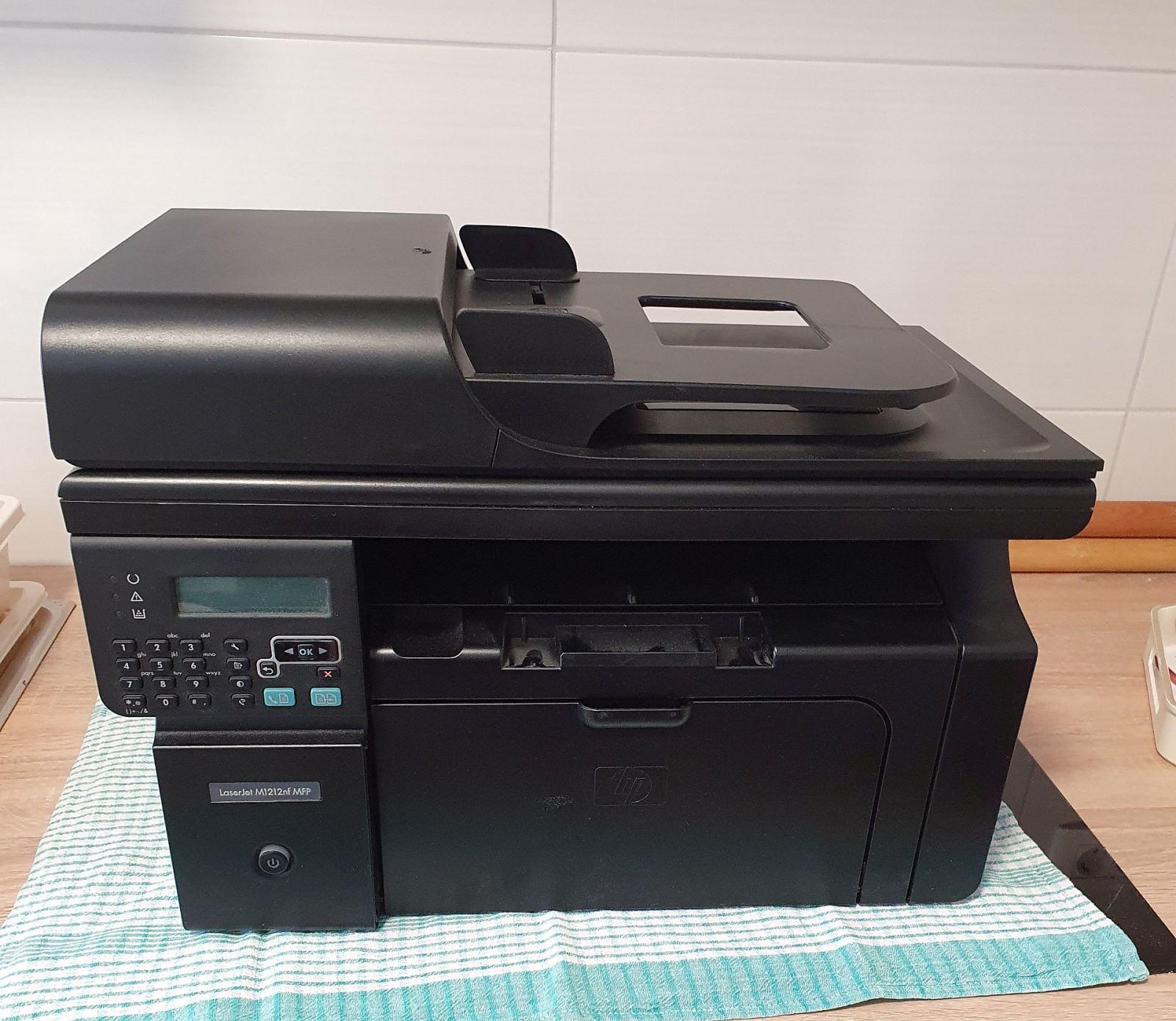 Printer + scanner + fax - HP LaserJet 1212nf MFP