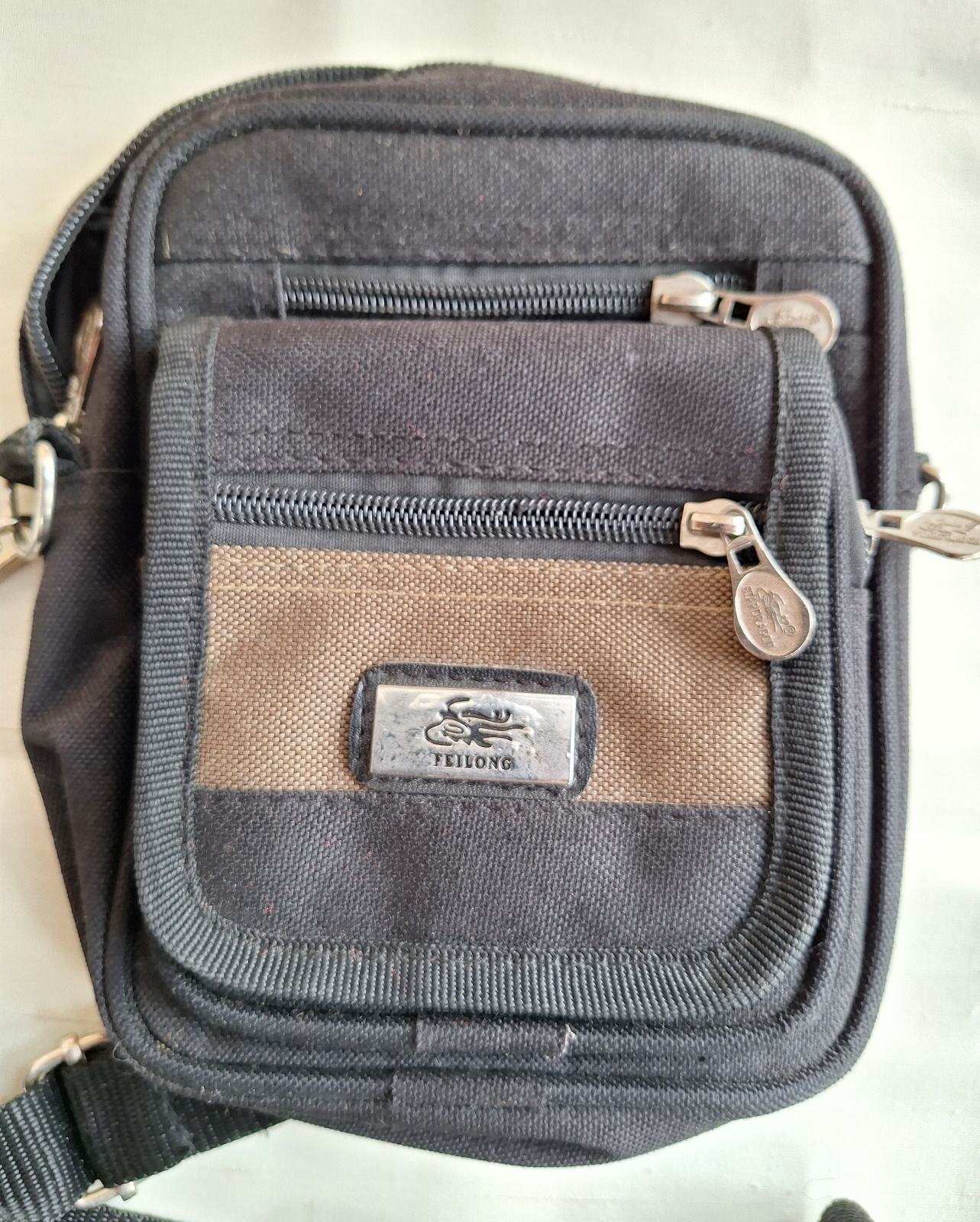 MUŠKA TORBICA PREKO RAMENA FEILONG-NEKORIŠTENA