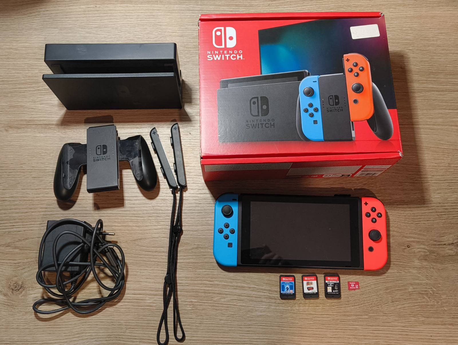 Nintendo Switch OLED 64gb + 128gb SD i 3 igrice