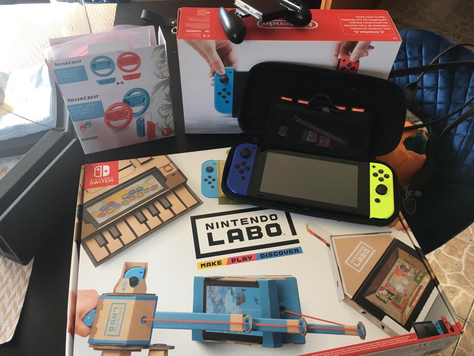 Nintento Switch + 8 igre