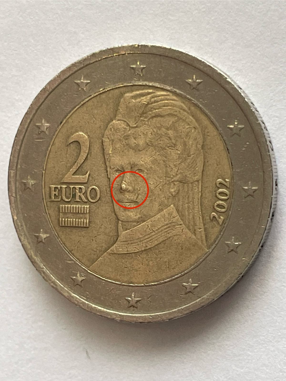 Kovanica 2 eura 2002 Austrija, greška u kovanju