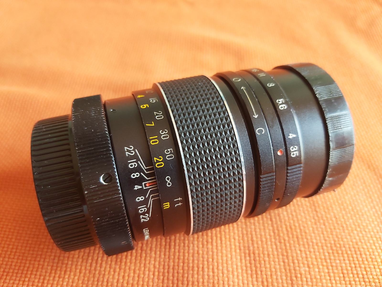 135mm f/3.5 m42 Welt Blick (Komine) poklopci