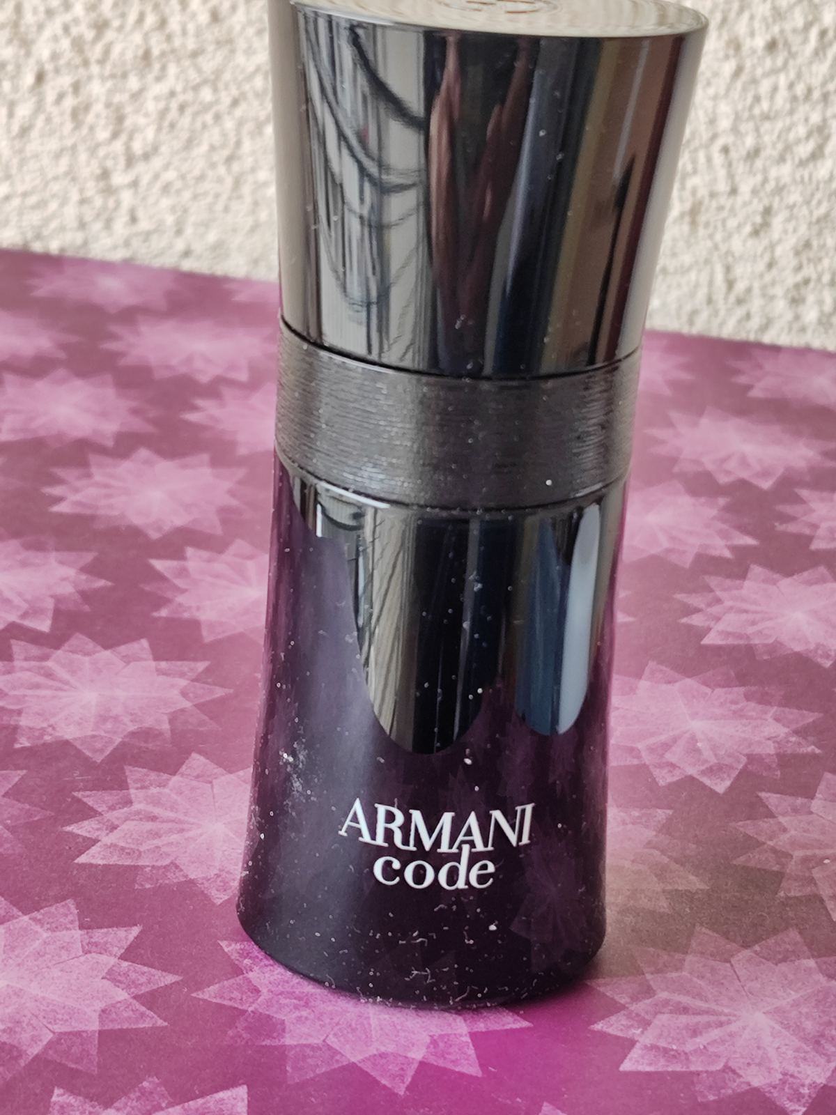 Prazna staklena bočica ARMANI CODE parfema by Giorgio Armani