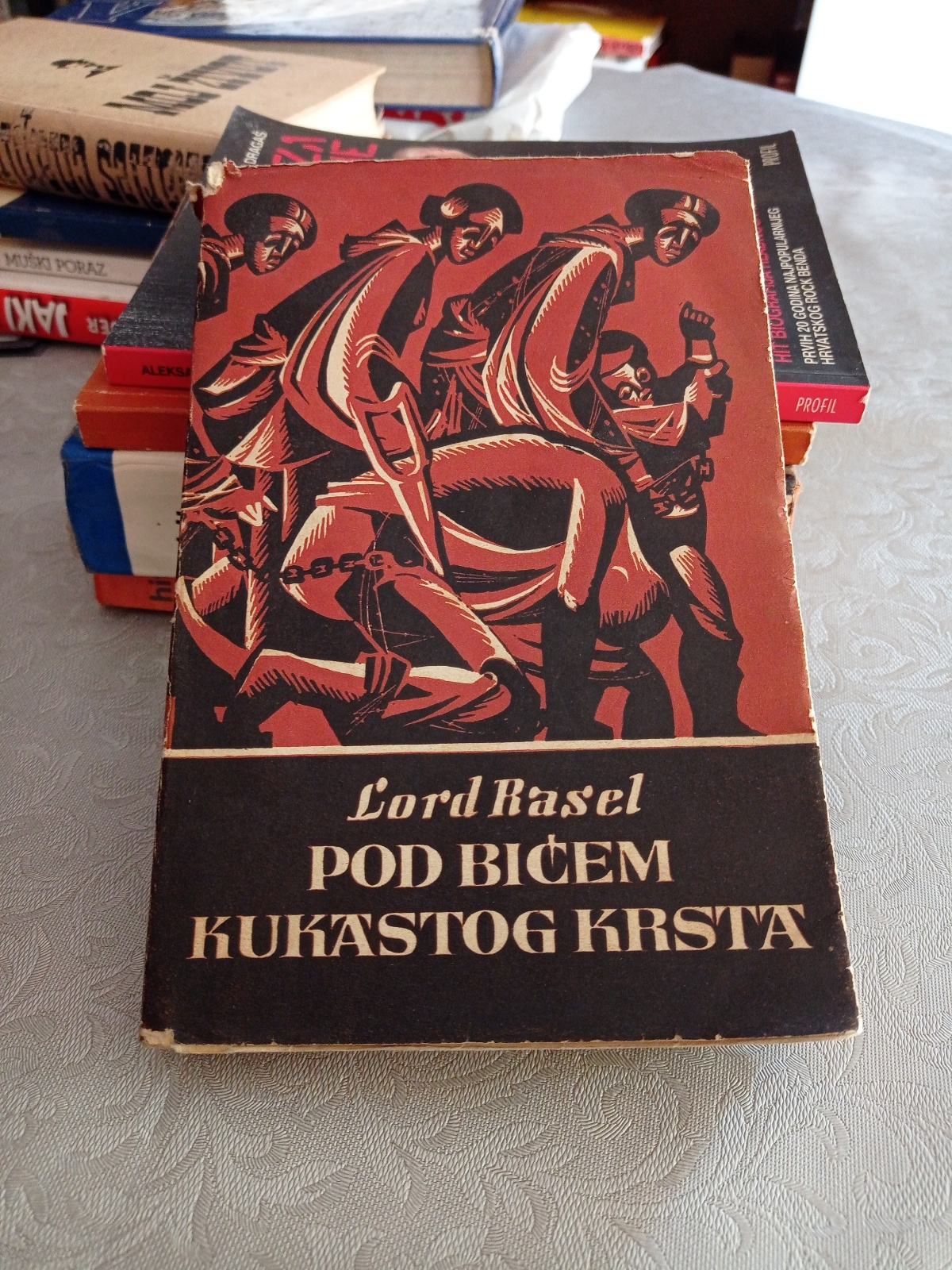 Lord Rasel Pod bićem kukastog krsta